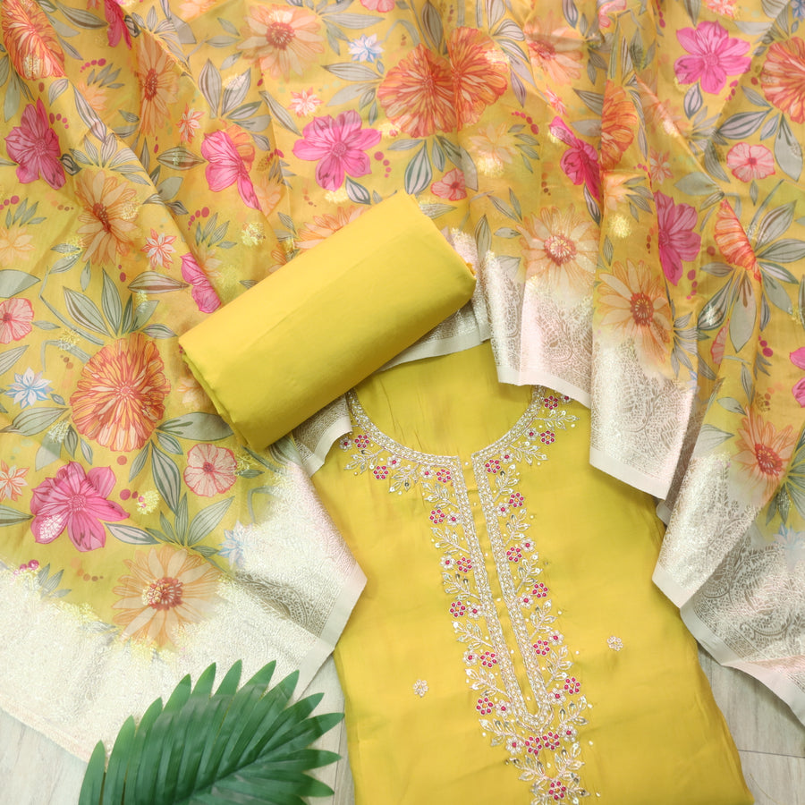 Ishaani Turmeric Yellow Embellished Neck with Moti Work Modal Suit Set ...
